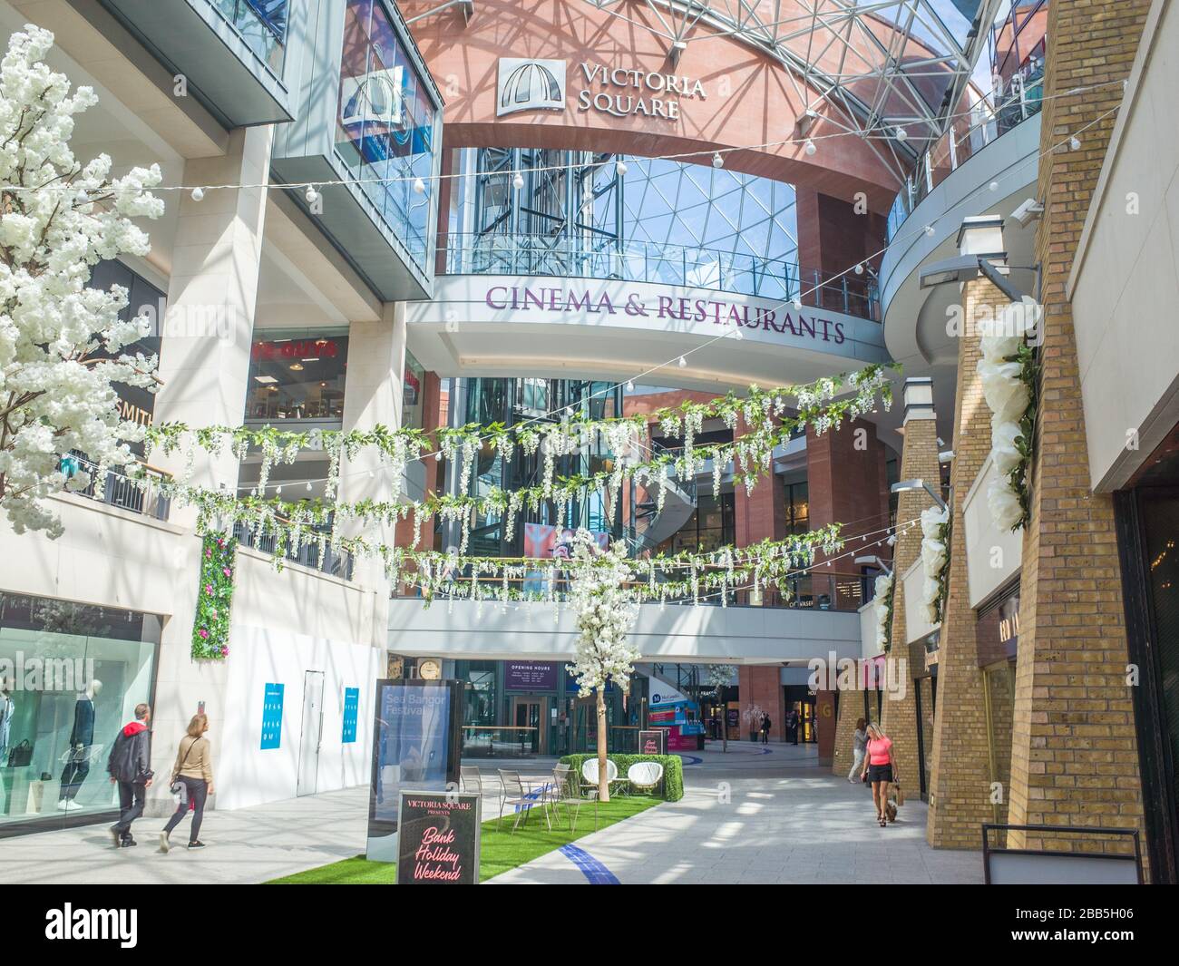 BELFAST, NORTHERN IRELAND- Belfast shopping high street- people walking ...