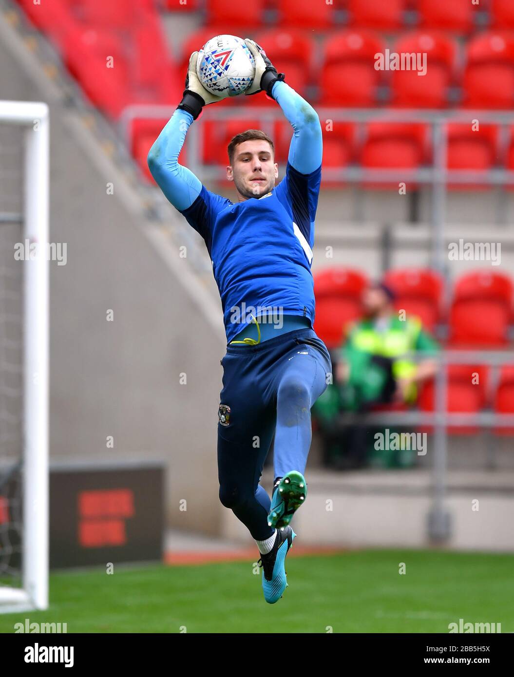 Coventry City goalkeeper Marko Marosi warms up ahead of the match Stock ...