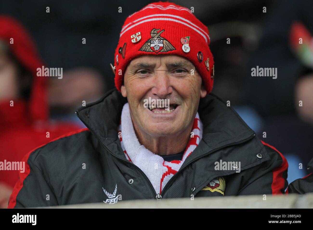 A fan in the stands prior to the match Stock Photo - Alamy