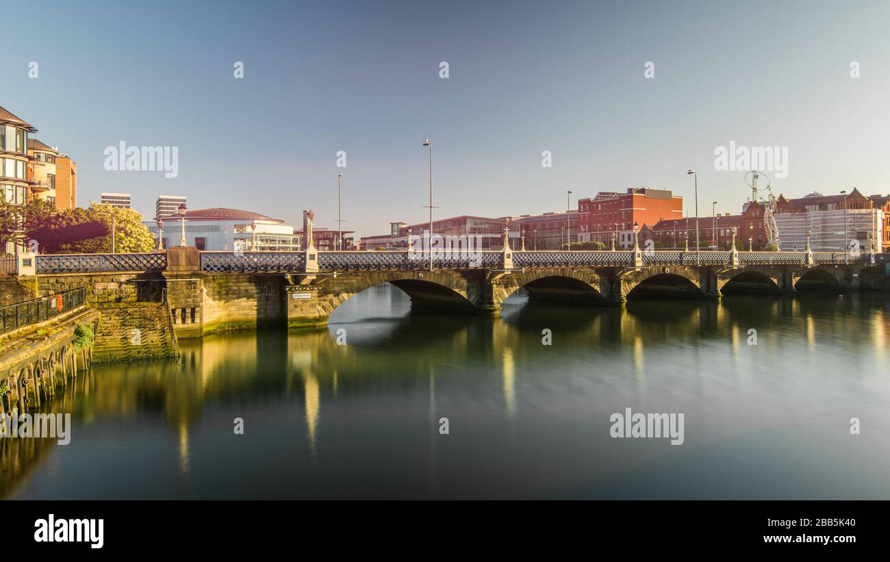 Belfast, Northern Ireland- Queens Bridge and the Belfast skyline Stock ...