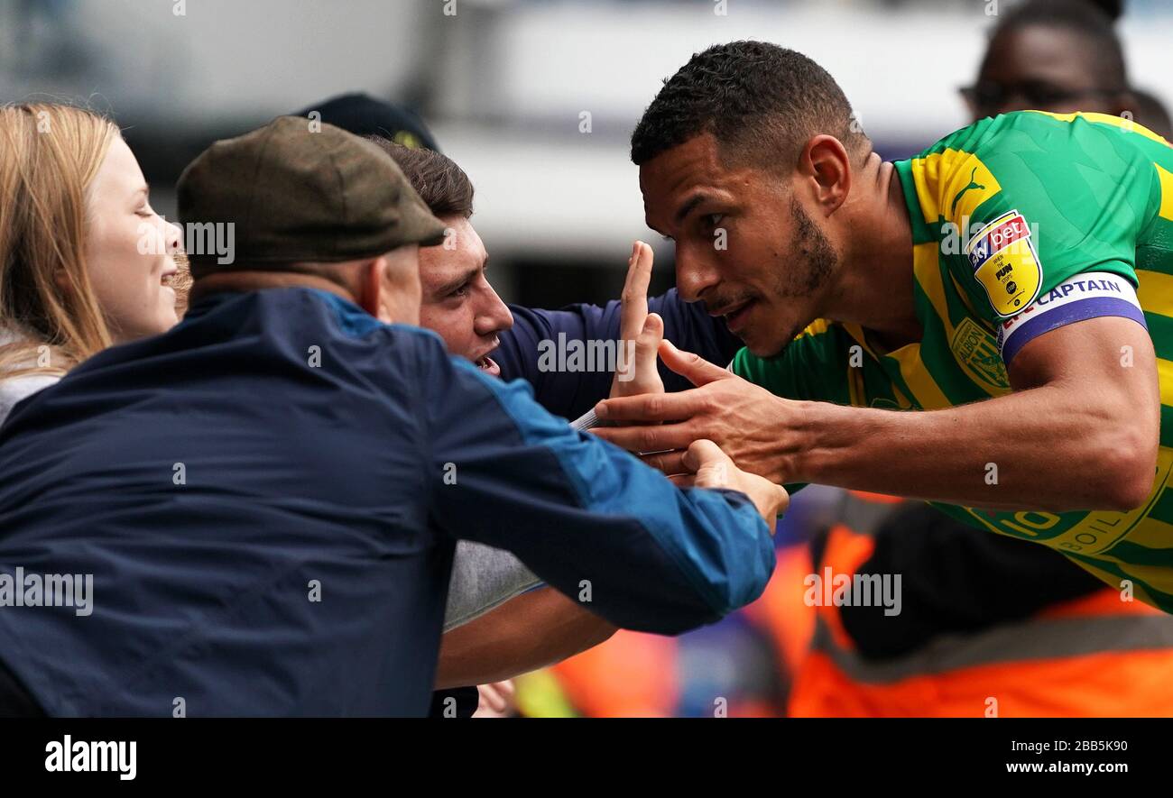 West Bromwich Albion's Jake Livermore celebrates with fans at full time ...