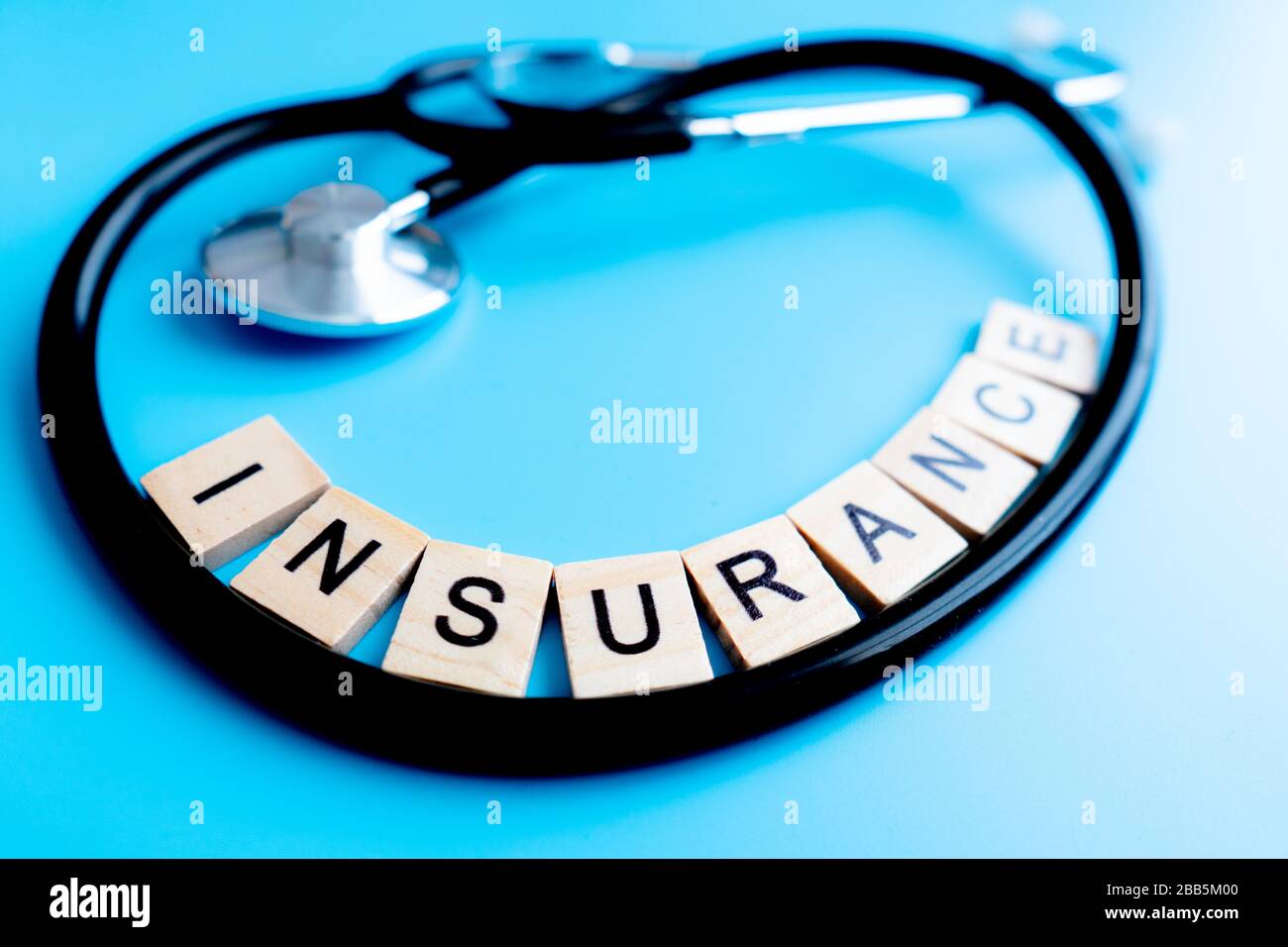 Health insurance word with stethoscope - health concept. Medical ...