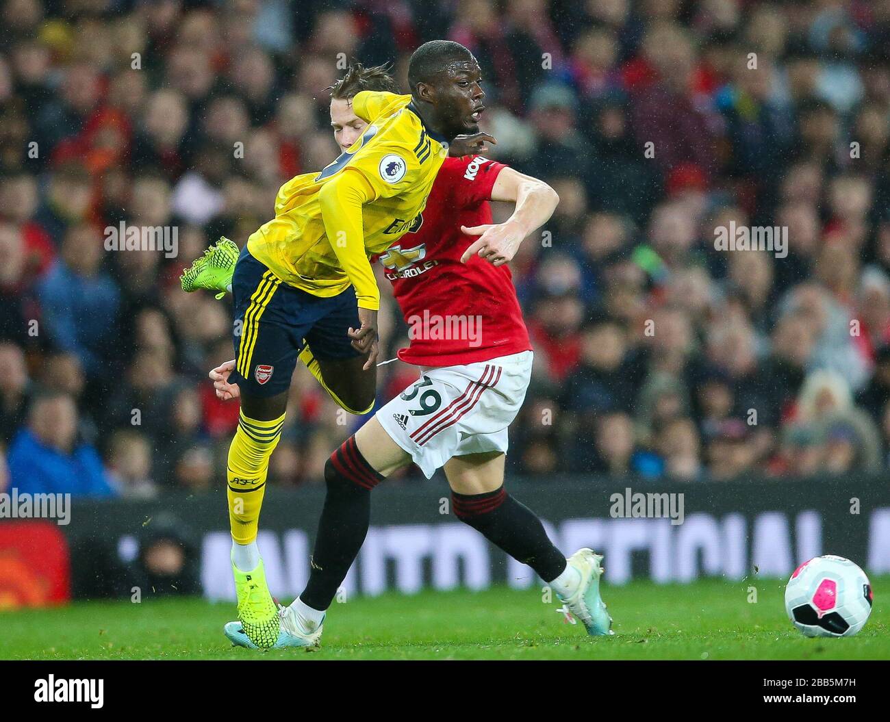 Manchester United's Scott McTominay and Arsenal's Nicolas Pepe during ...