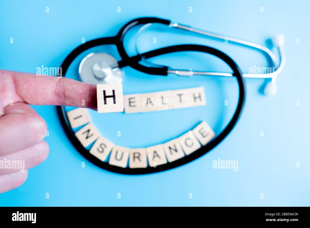 Health insurance word with stethoscope - health concept. Medical ...