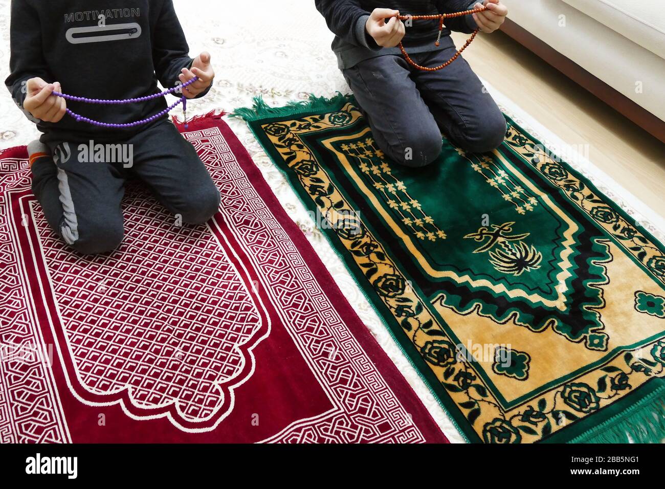 Muslim children praying hi-res stock photography and images - Alamy
