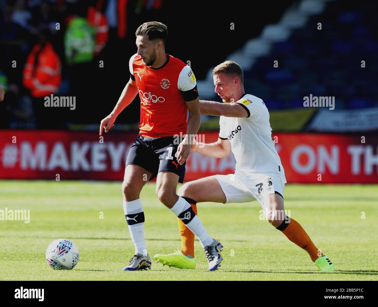 Luton Town's Harry Cornick (left) and Hull City's Matthew Pennington ...