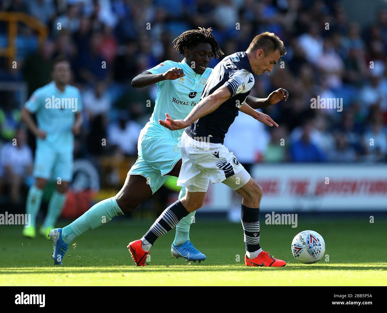 Millwall's Jed Wallace and Queens Park Rangers' Eberechi Eze in action ...