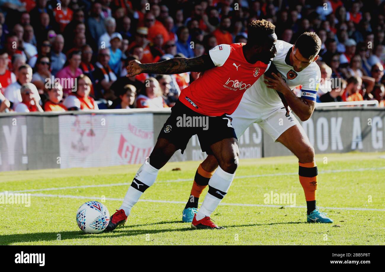 Luton Town's Kazenga LuaLua (left) and Hull City's Eric Lichaj (right ...