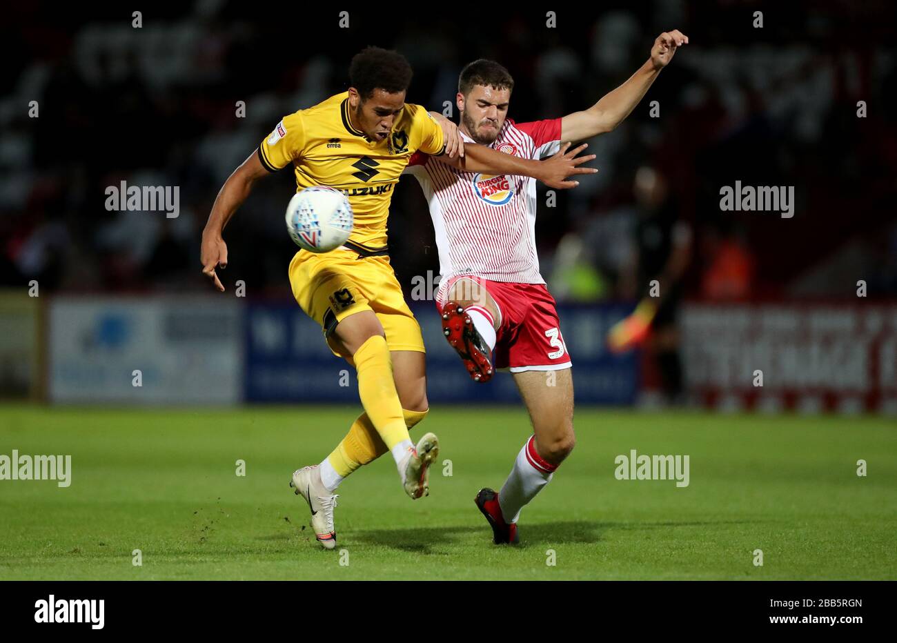 Milton Keynes Dons’s Sam Nombe in action with Stevenage’s Luis ...