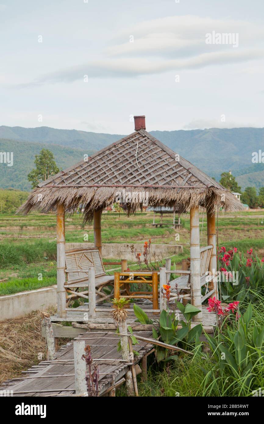 The simple canopy has a table and chairs for guests Stock Photo - Alamy