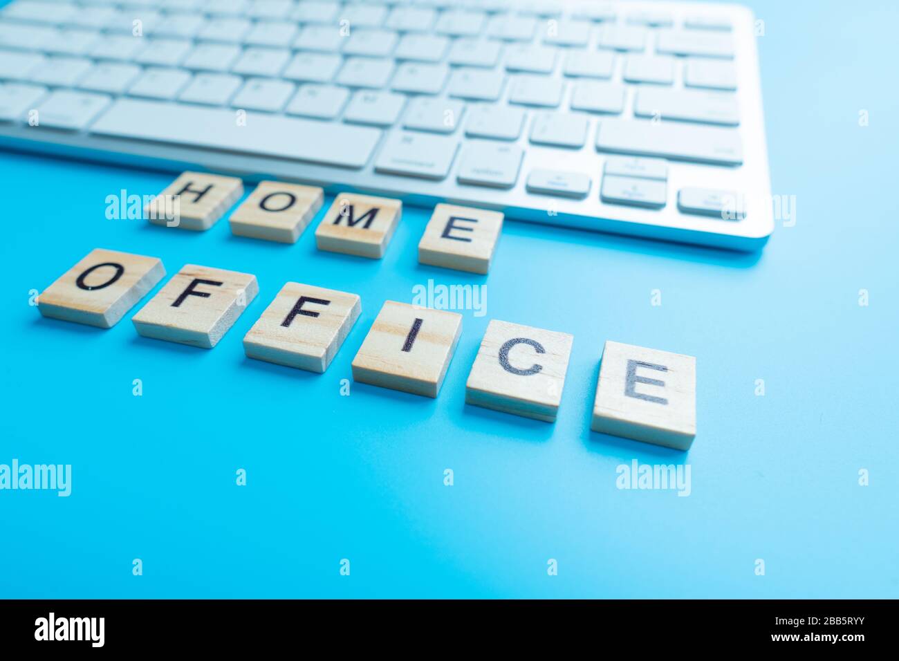 home office work from home concept with letters wooden. And keyboard ...