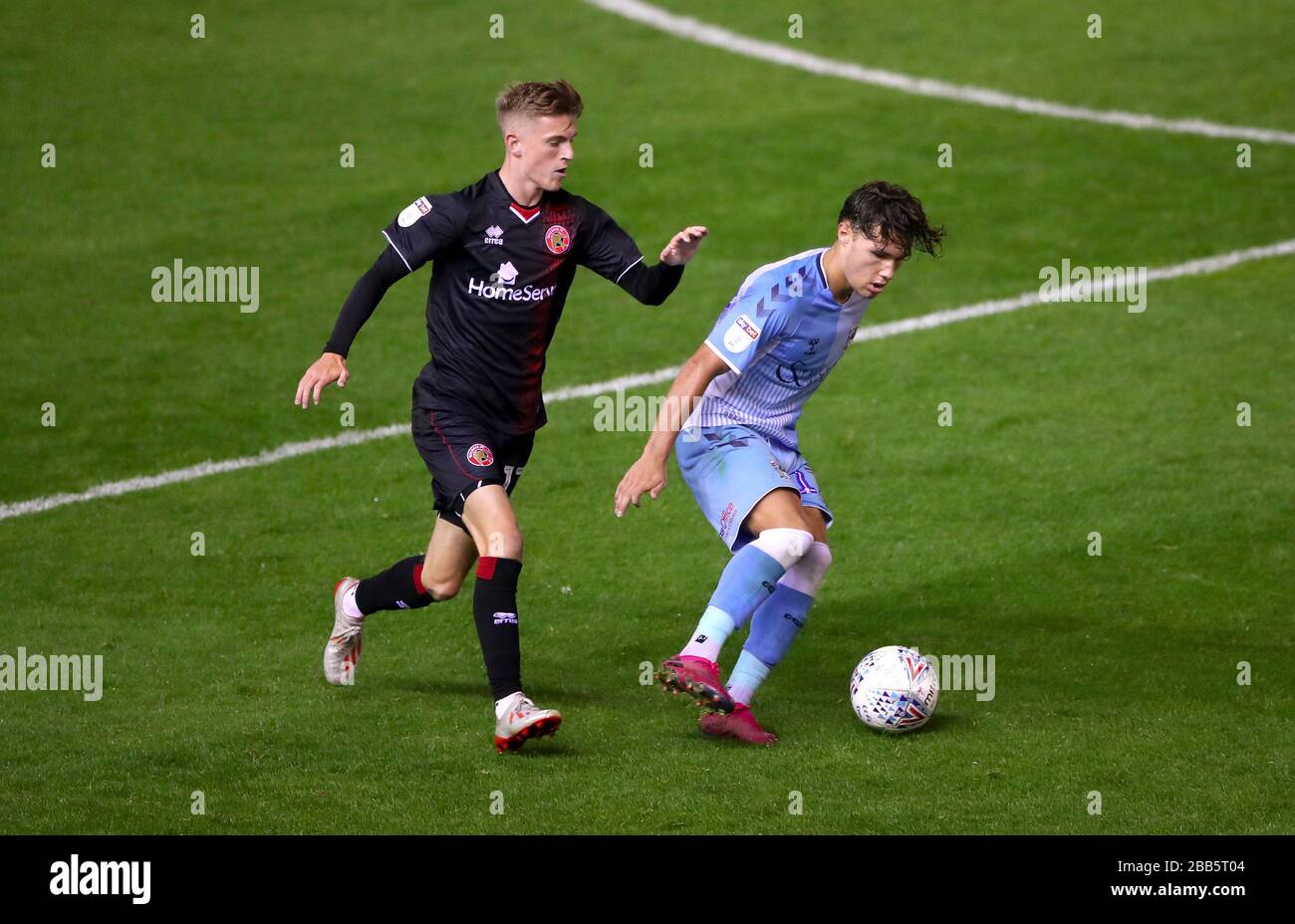 Walsall's James Hardy (left) and Coventry City's Callum O'Hare battle ...