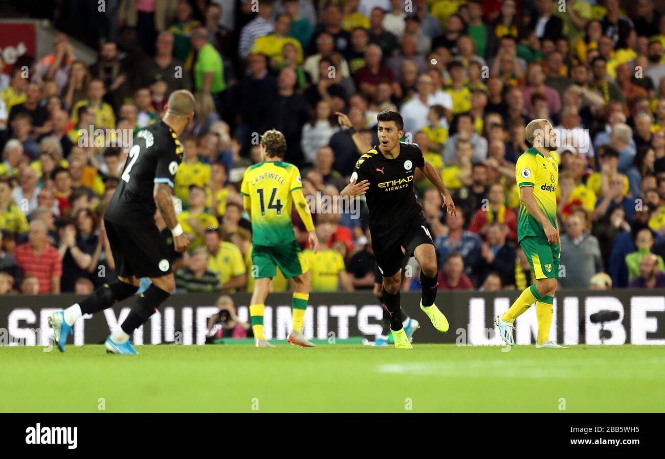 Manchester City's Rodrigo (second right) celebrates scoring his side's ...