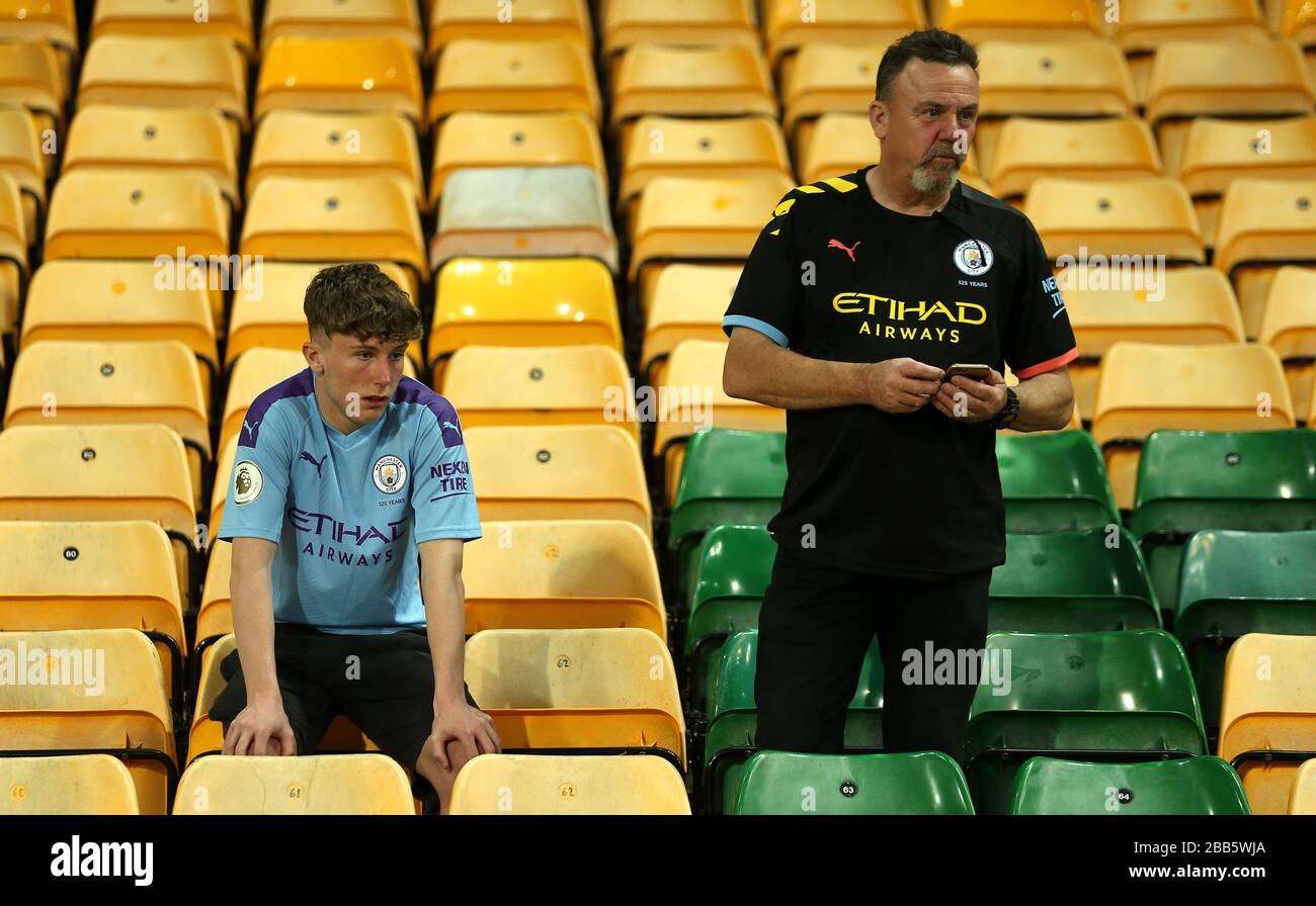 Manchester City fans in the stands react after the final whistle Stock ...