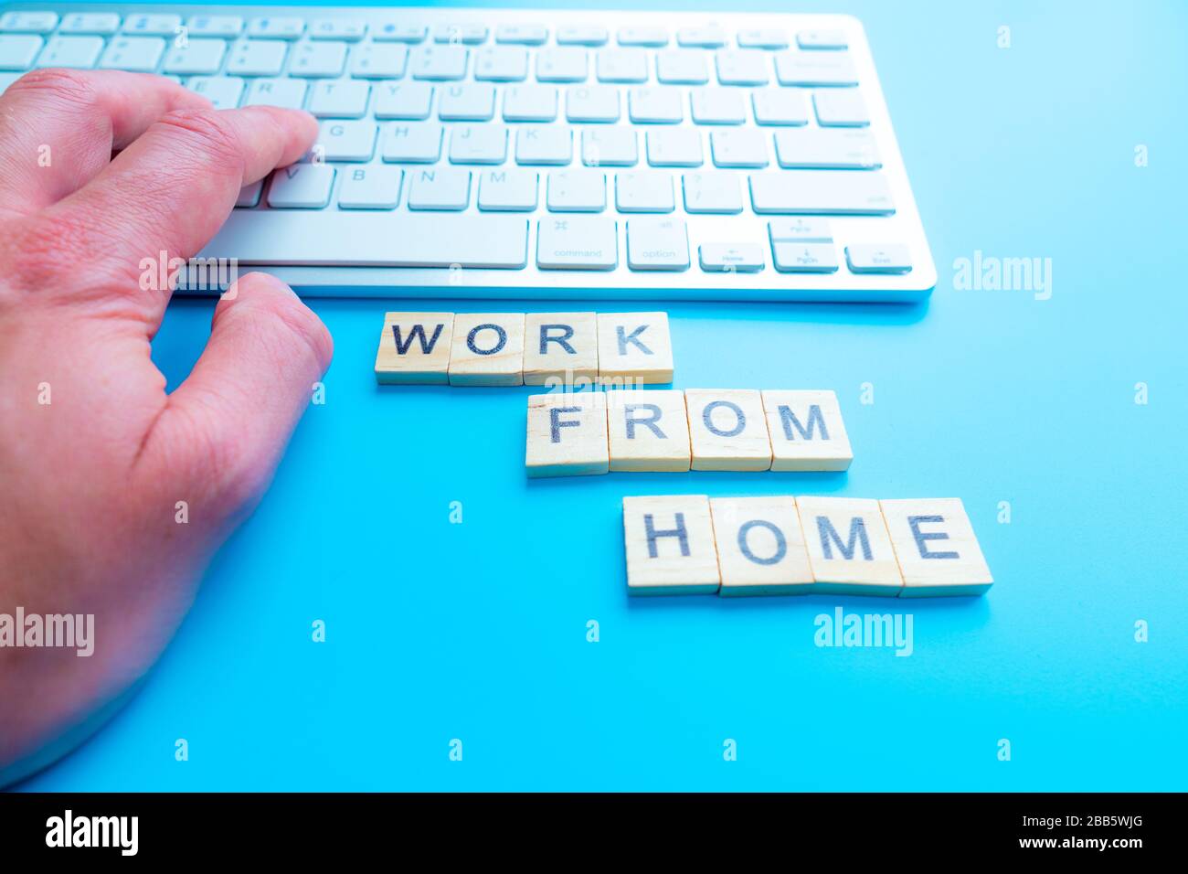 Work From Home, message concept written post it on laptop keyboard ...
