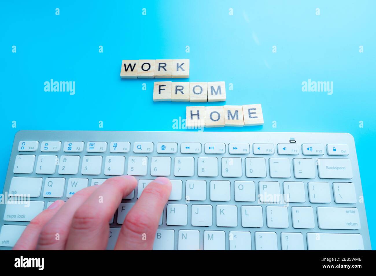 Work From Home, message concept written post it on laptop keyboard ...