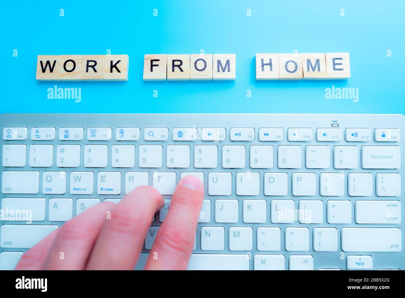 concept work from home 'Work From Home' written post it on laptop ...