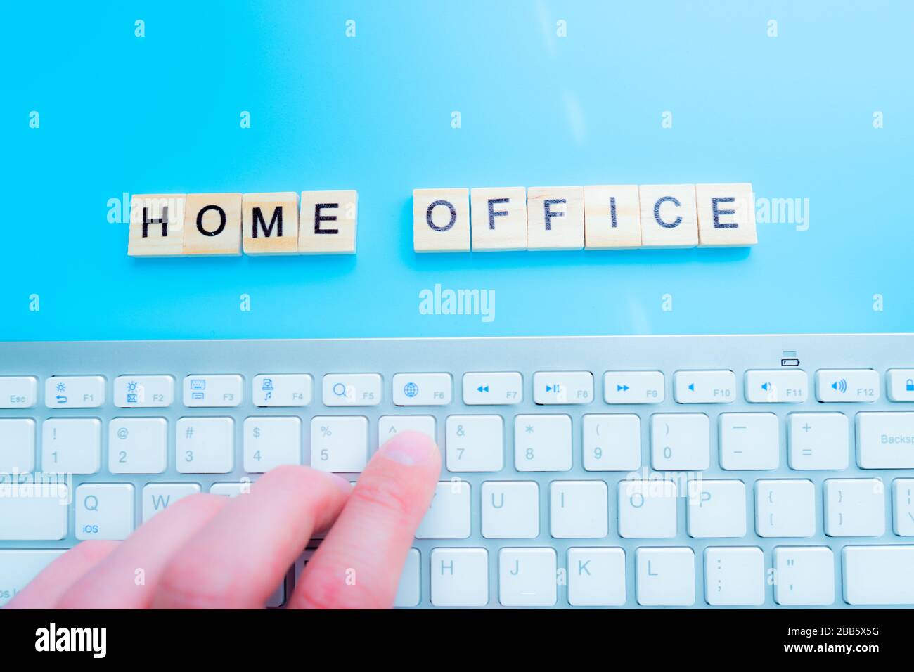 home office work from home concept with letters wooden. And keyboard ...