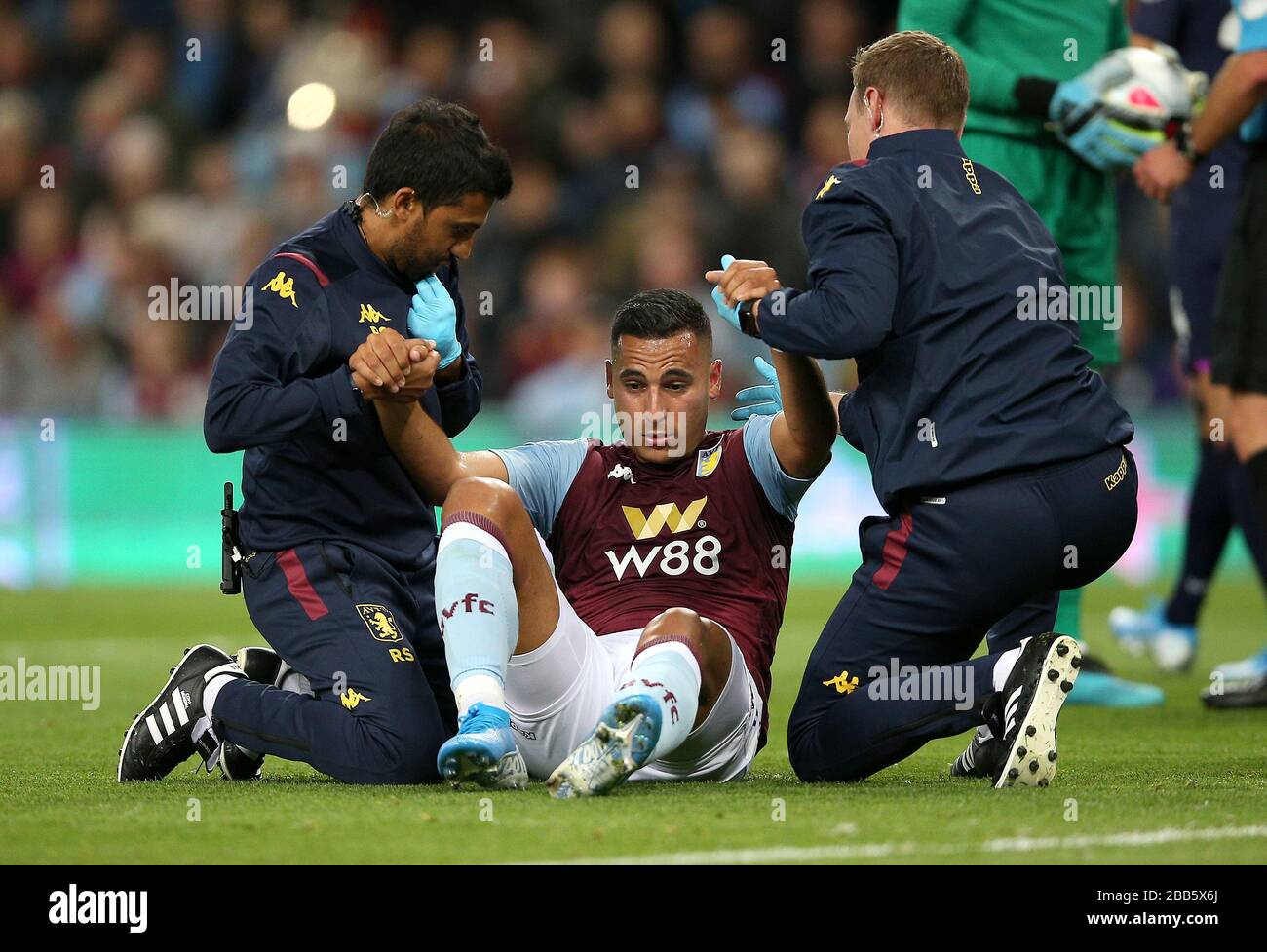 Aston Villa's Anwar El Ghazi is helped to his feet after a collision ...