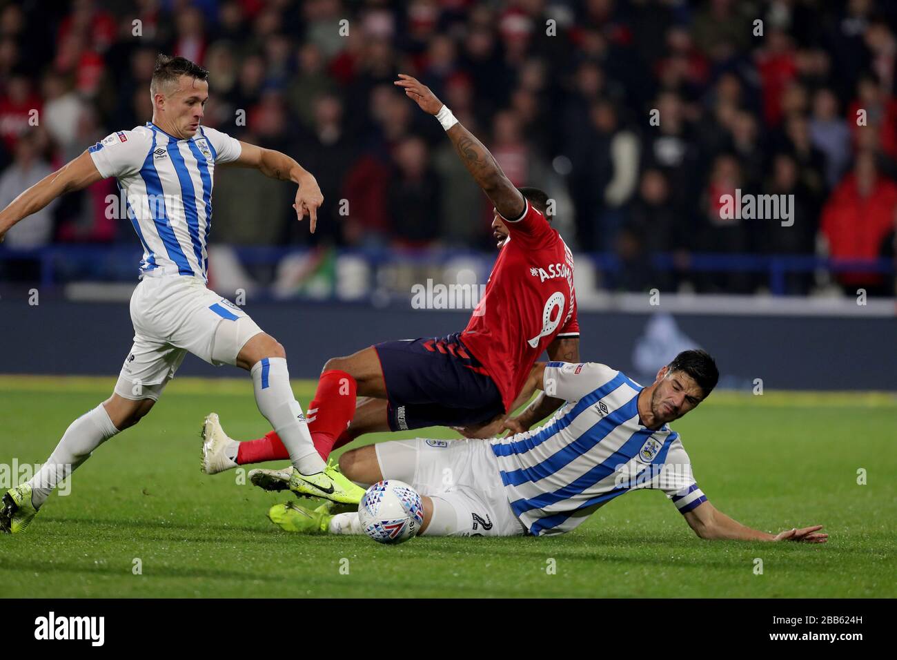 Huddersfield Town's Jonathan Hogg, Middlesbrough's Britt Assombalonga ...