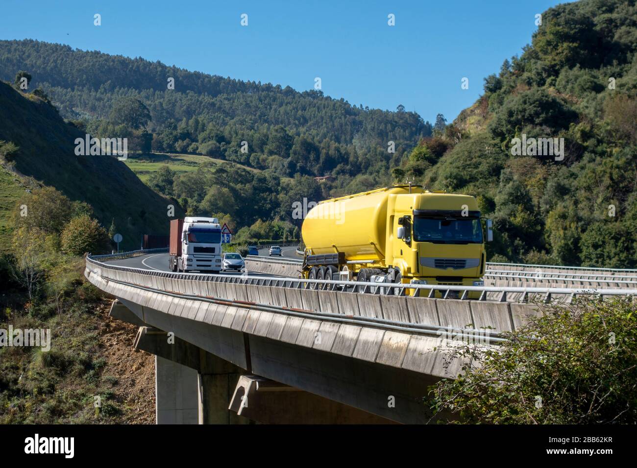 Trucks on the road, for goods delivery Stock Photo - Alamy