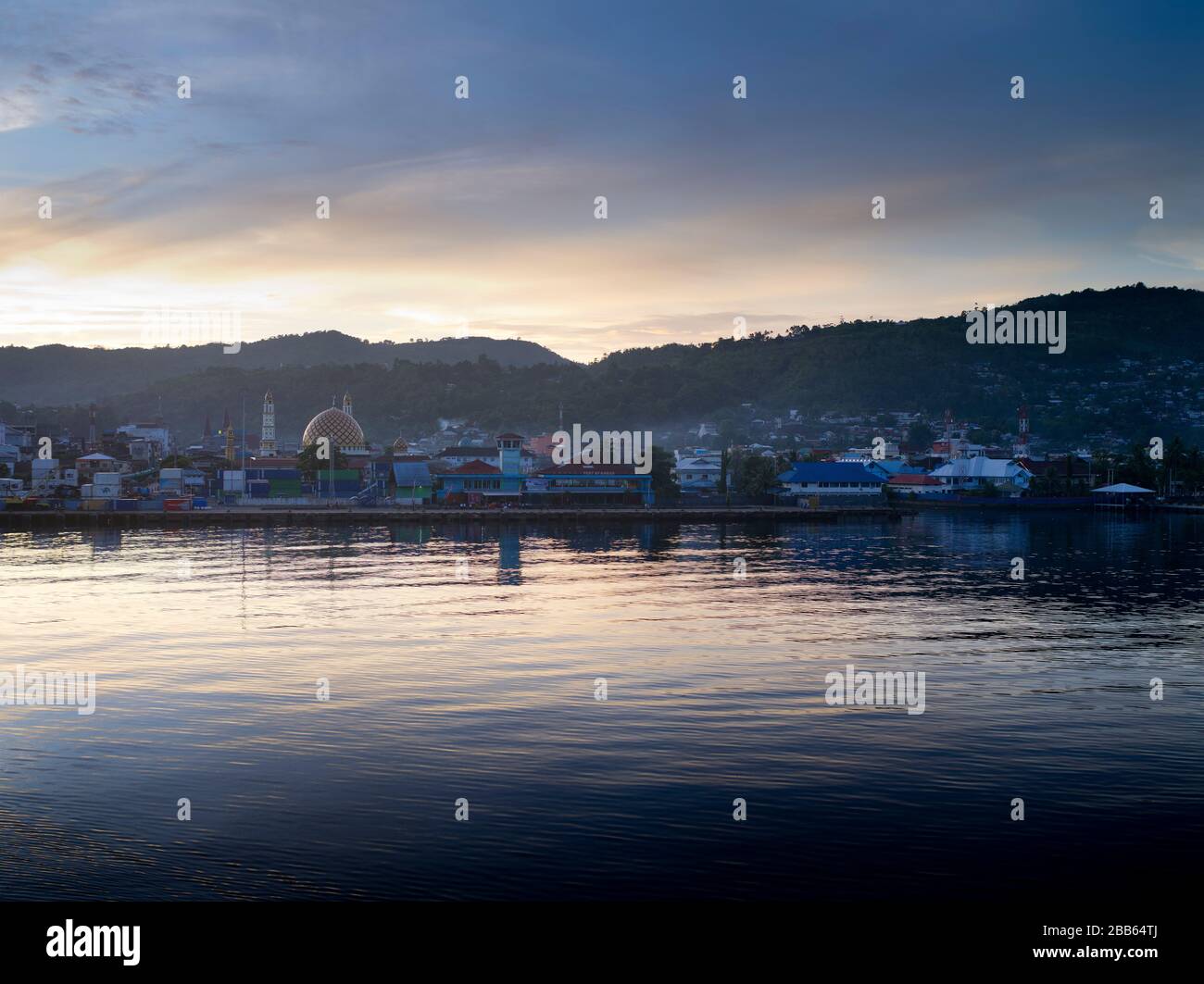 dh Indonesian island city AMBON MALUKU INDONESIA Arriving port sunrise ...