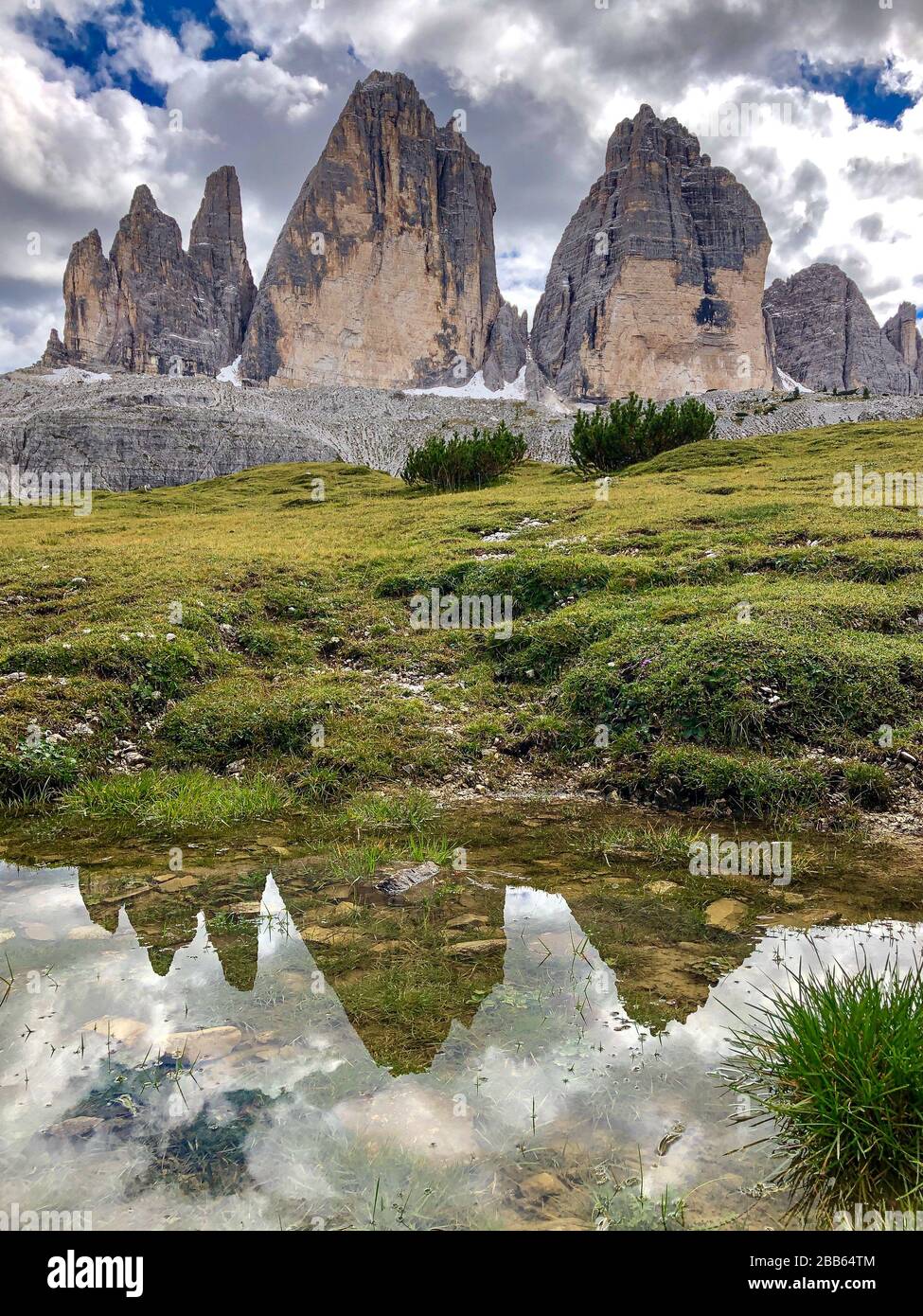 Tre Cime di Lavaredo reflection in a stream, Dolomites, Toblach ...