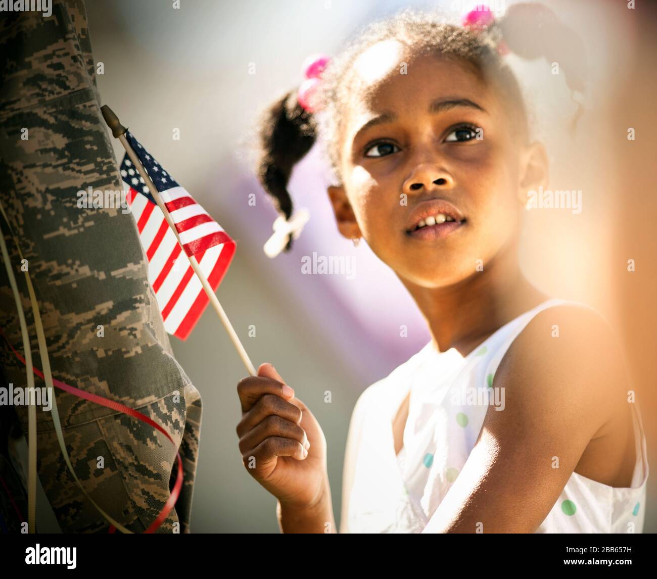 Children in military uniform holding flags hi-res stock photography and ...