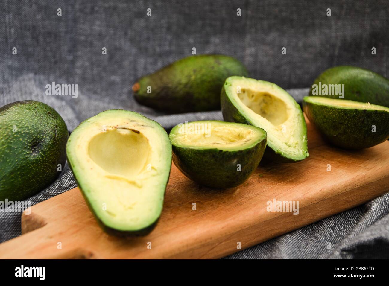 Halves fresh avocado, Ripe avocado and cut avocado with bone Stock ...