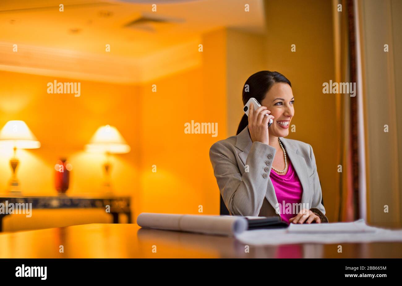 Woman holds phone papers hi-res stock photography and images - Alamy