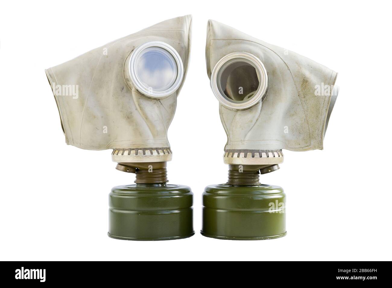 two old soviet gas masks on a white background. concept of peace and ...