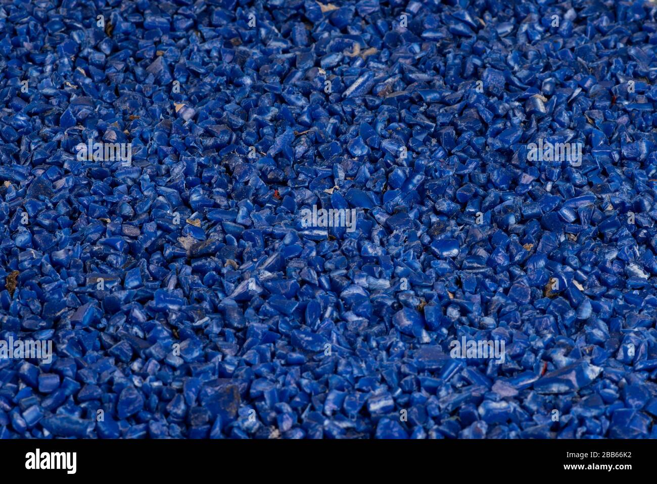Granular recycled blu plastic Stock Photo - Alamy