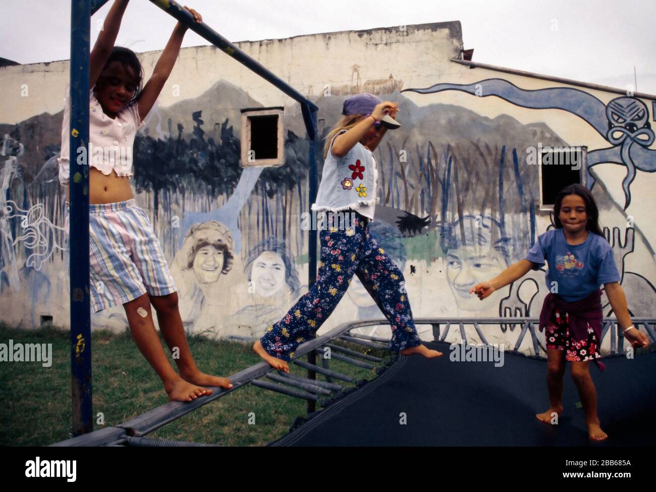 East Cape New Zealand Maori children Playing Jumping on Trampoline ...