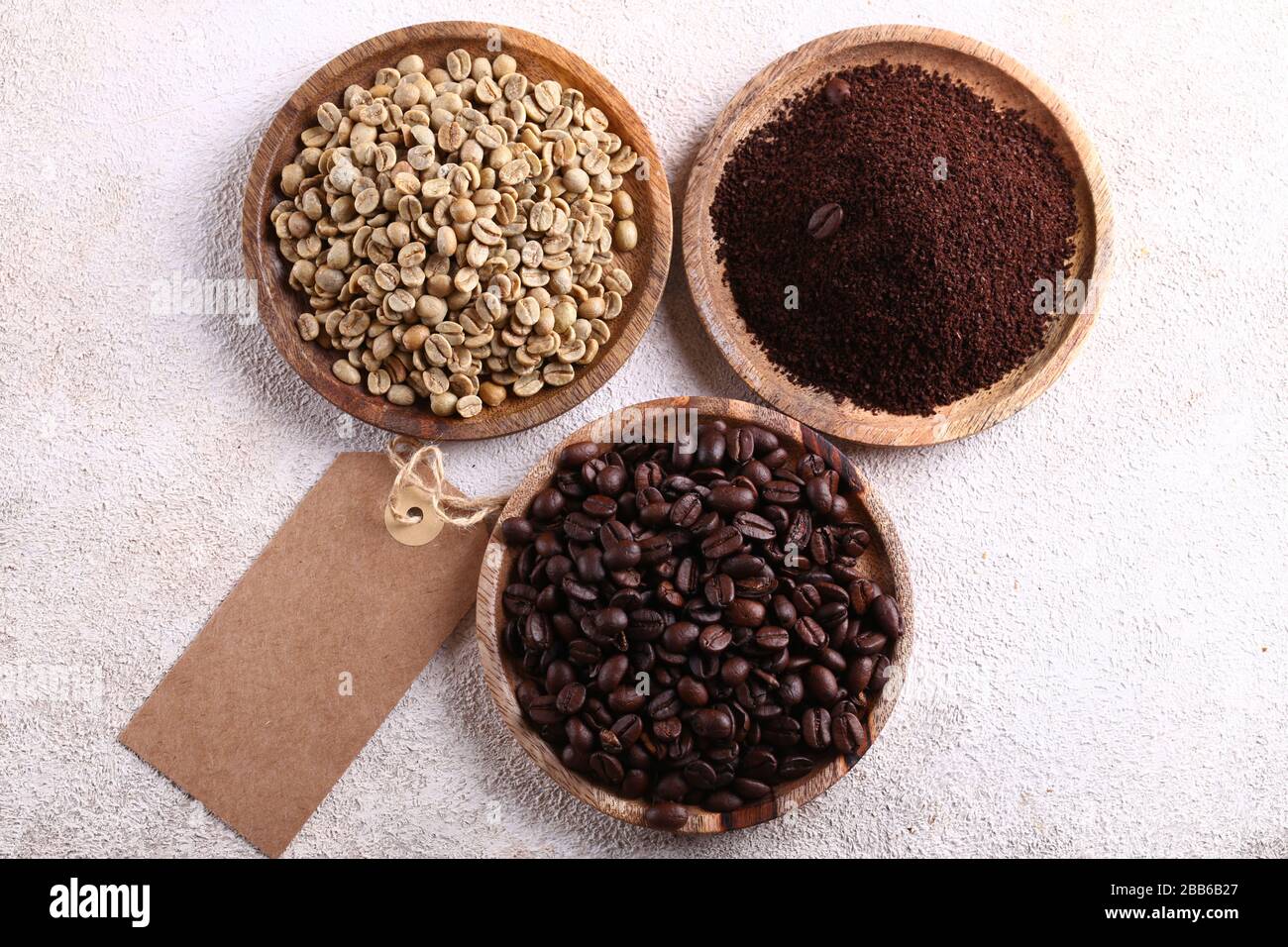 natural organic coffee beans on a light background Stock Photo - Alamy