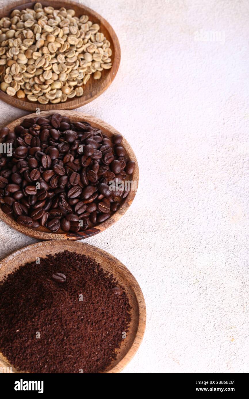 natural organic coffee beans on a light background Stock Photo - Alamy