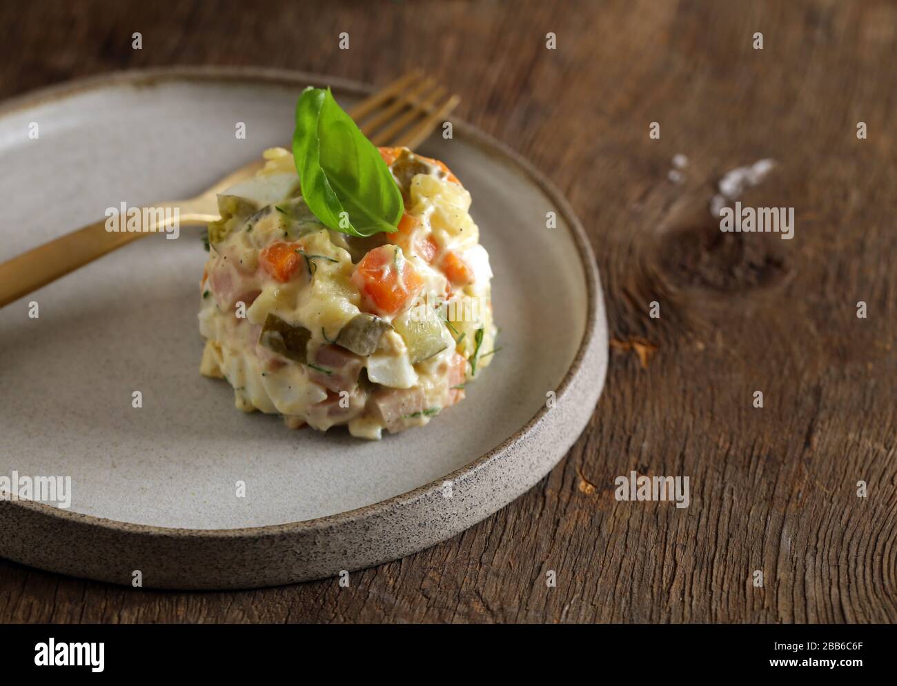 traditional russian salad with mayonnaise Stock Photo - Alamy