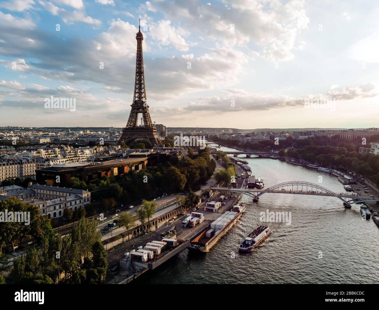 Beautiful Aerial view of Paris skyline over Seine river with boats ...