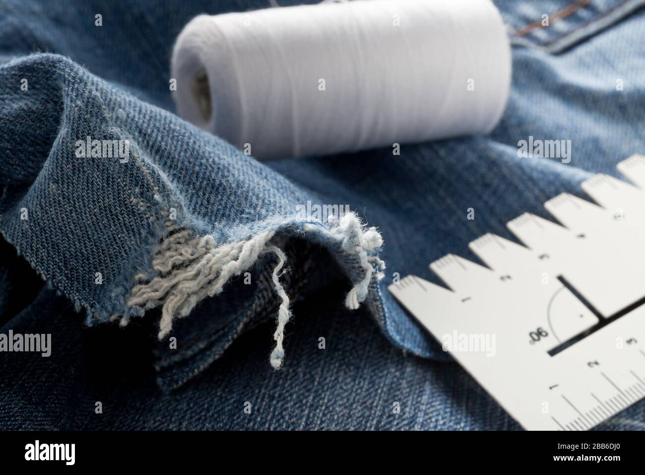Torn fabric repair hi-res stock photography and images - Alamy