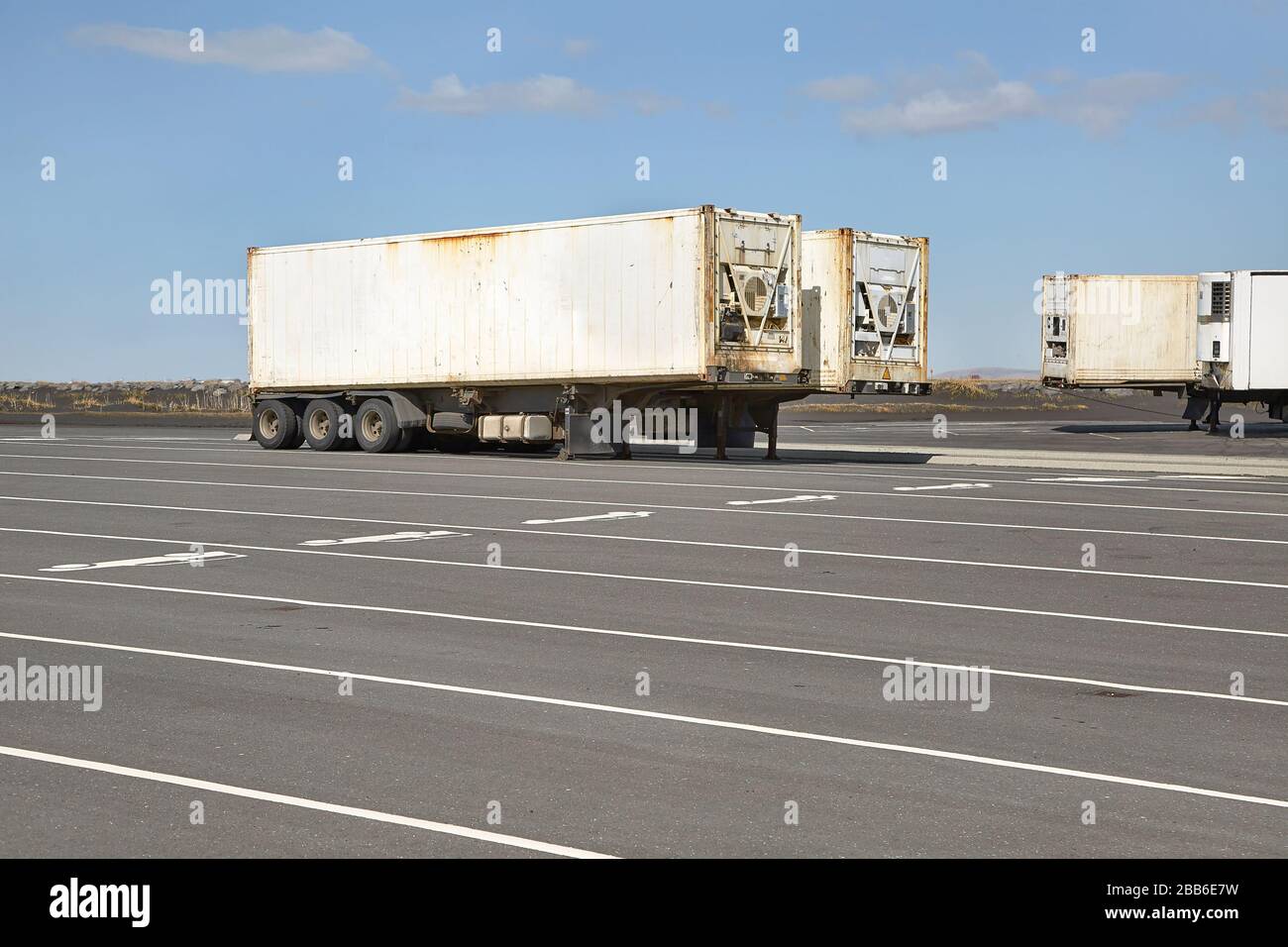 Container carrier trailers parked Stock Photo - Alamy