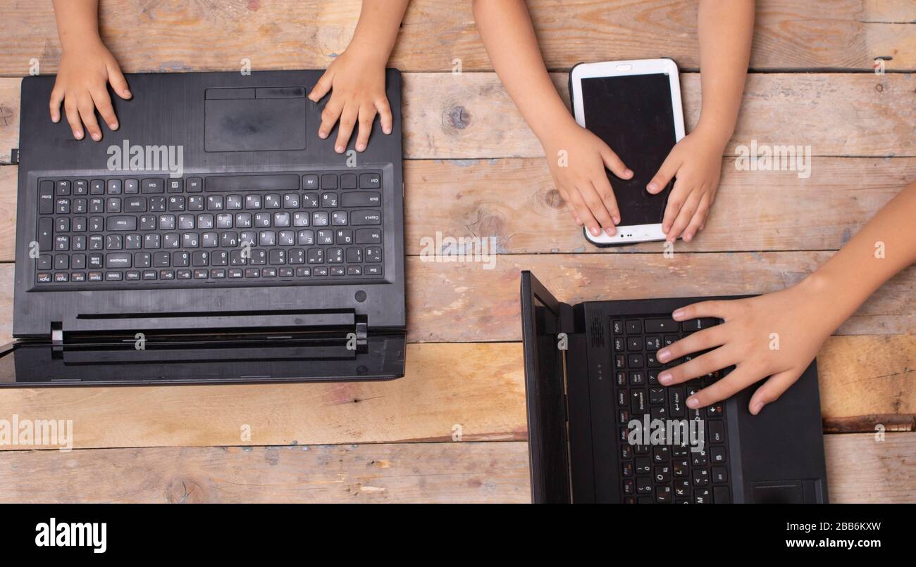 Kids hands using keyboard playing hi-res stock photography and images ...