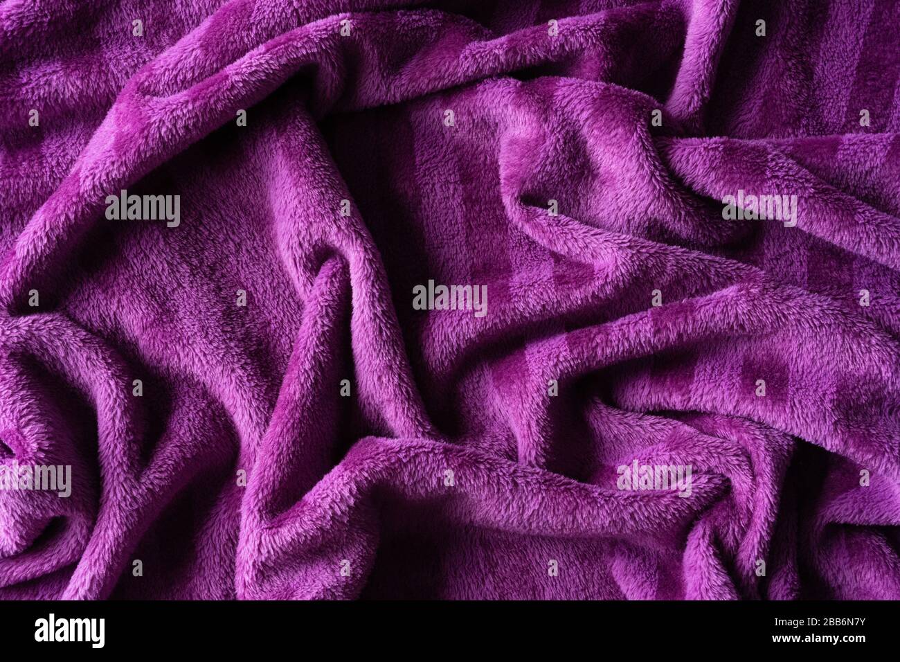 Texture purple velvet fabric close up Stock Photo - Alamy
