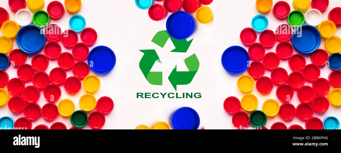 Reuse of waste. Collage with plastic bottle caps and recycling sign on ...