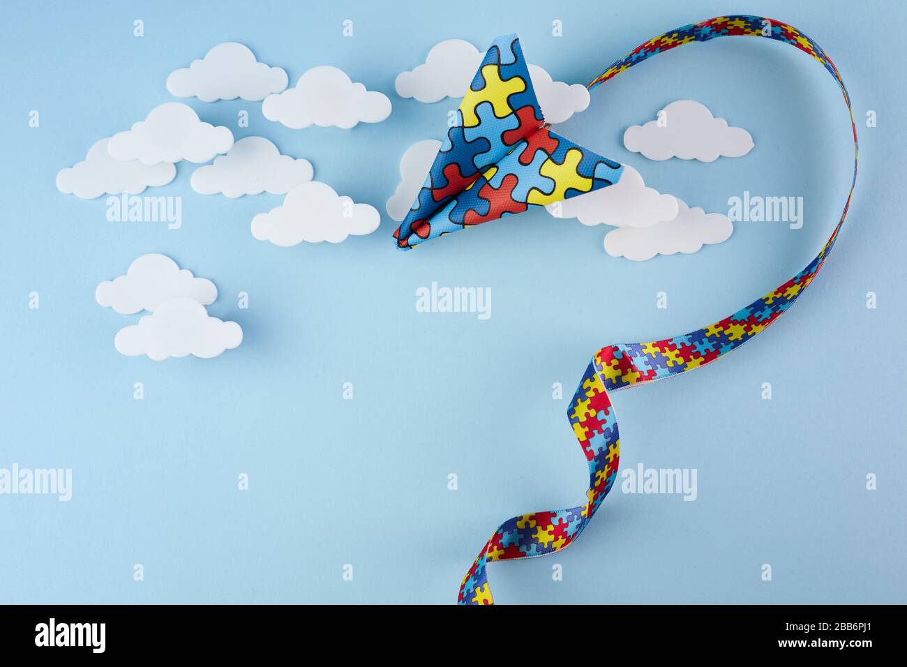 Autism awareness day or month. Paper plane in origami style with autism ...