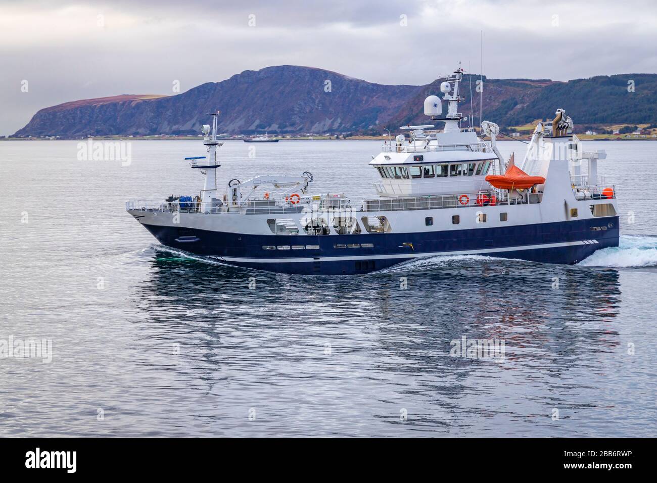 Trawler on the way along the Norwegian coast Stock Photo - Alamy