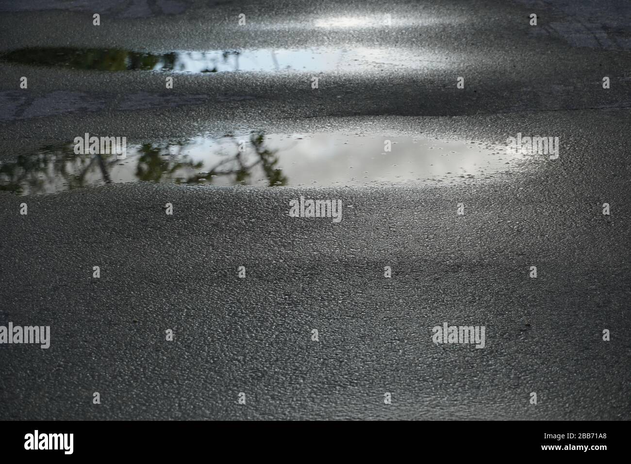 Rainwater puddles hi-res stock photography and images - Alamy