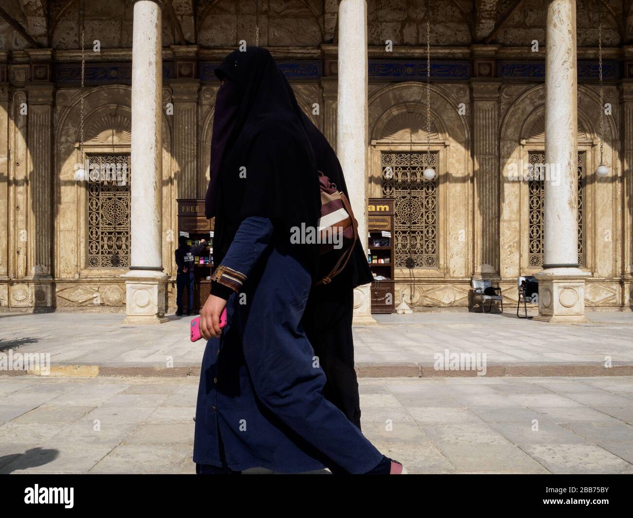 Cairo, Egypt, February, 2020, a traditional dressed egyptian woman ...