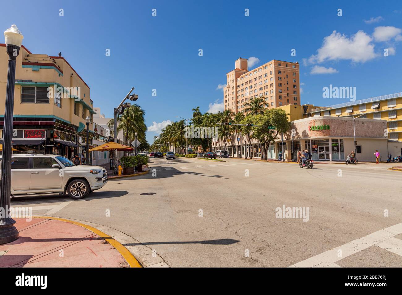 Landscape view of street of Miami. Colorful buildings on blue sky with ...