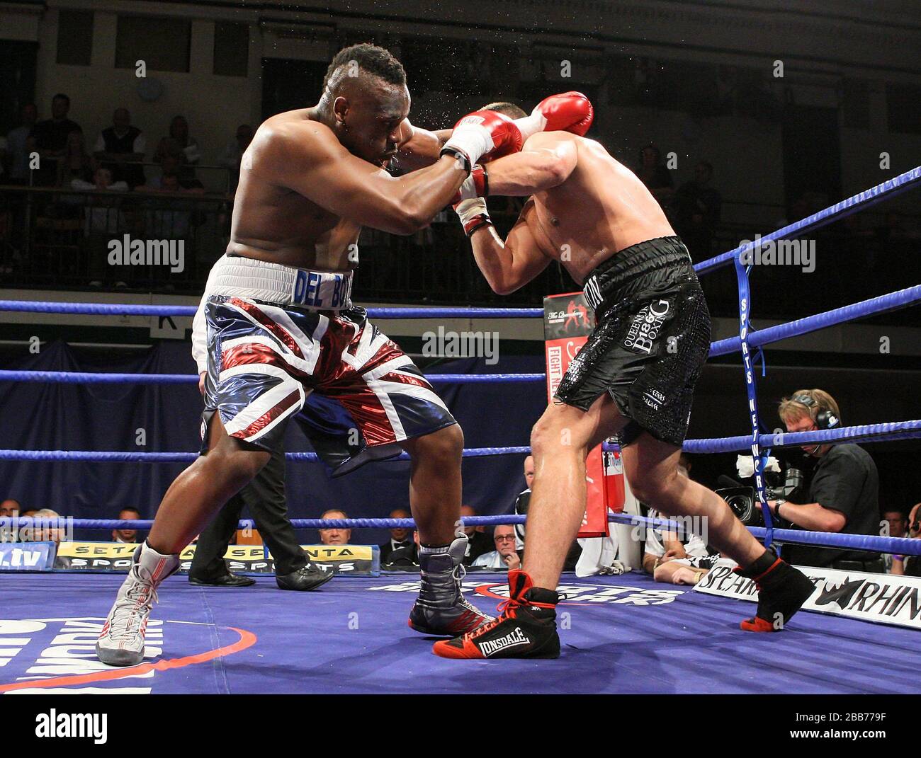 Derk Chisora (Finchley, union jack shorts) defeats Sam Sexton (Norwich ...