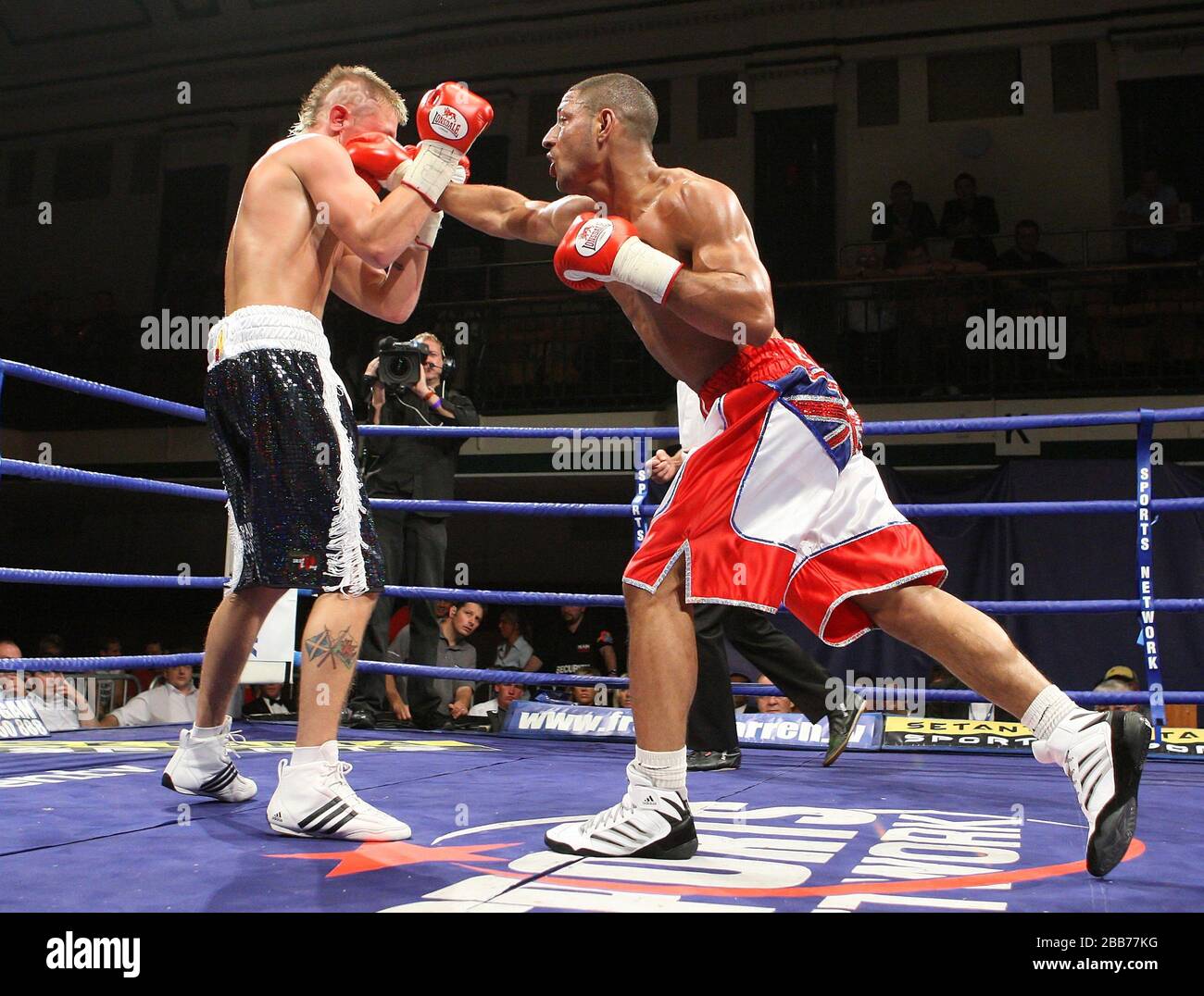 Kell Brook (Sheffield, red/white) shorts defeats Barrie Jones (Rhondda ...