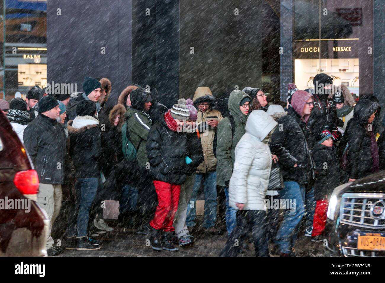 People on Times Square during snow blizzard in Manhattan, New York City ...